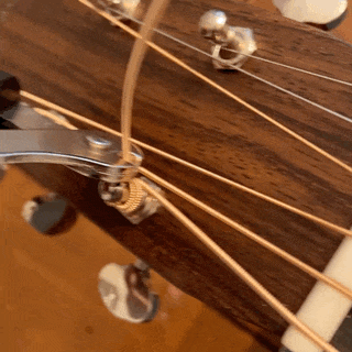 Changing Your Guitar Strings Without Screwing It Up - GuitarLessons.org